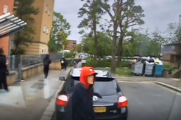 Watch as brazen thief smashes ambulance window to steal crew’s bags