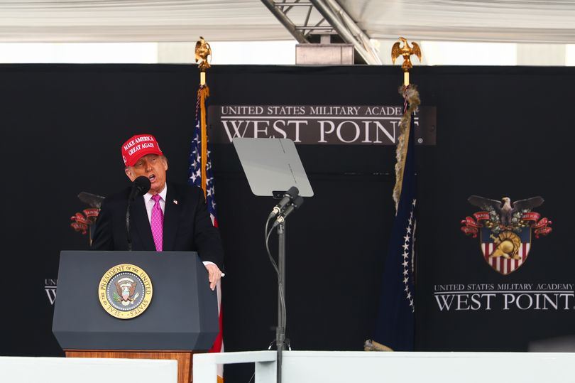 Trump sparks backlash by wearing giant MAGA hat and pink tie to formal ...