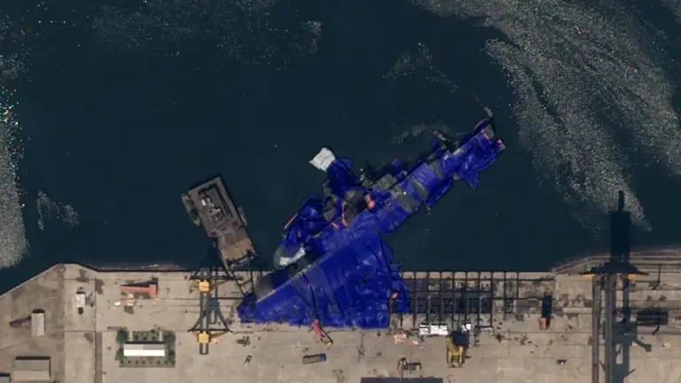 North Korea says it refloated capsized warship after botched launch