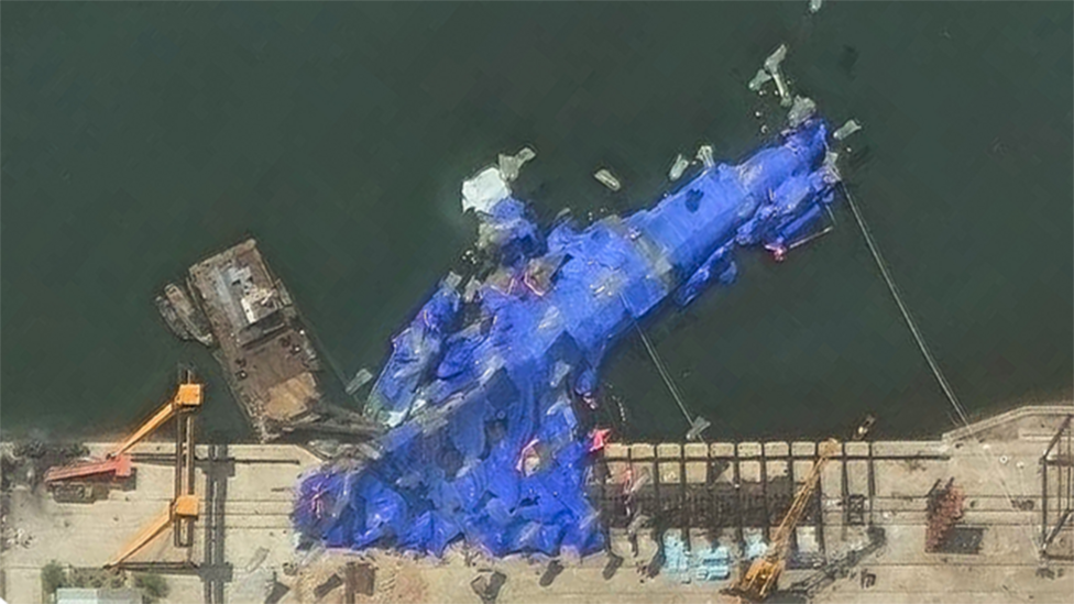 North Korea detains three over warship accident, state media says