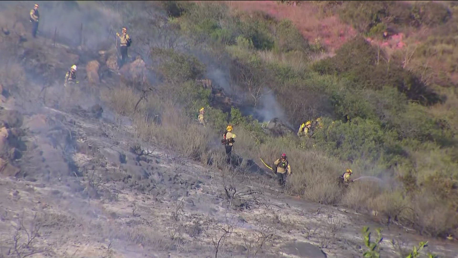 Crews gain control of a fire in Poway that broke out in a canyon