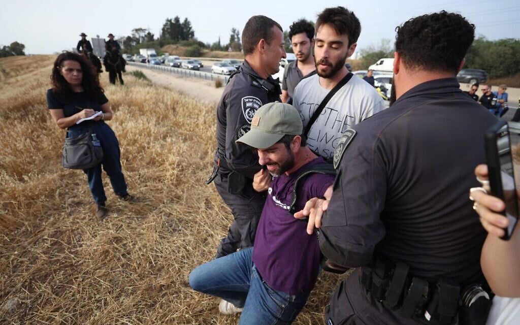 Activists say attempts to keep left-wing protesters in jail aim at ...