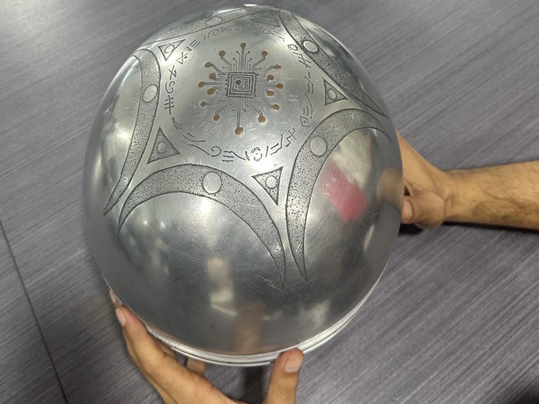 A mysterious metallic sphere, without joints and ancient scripts, found ...