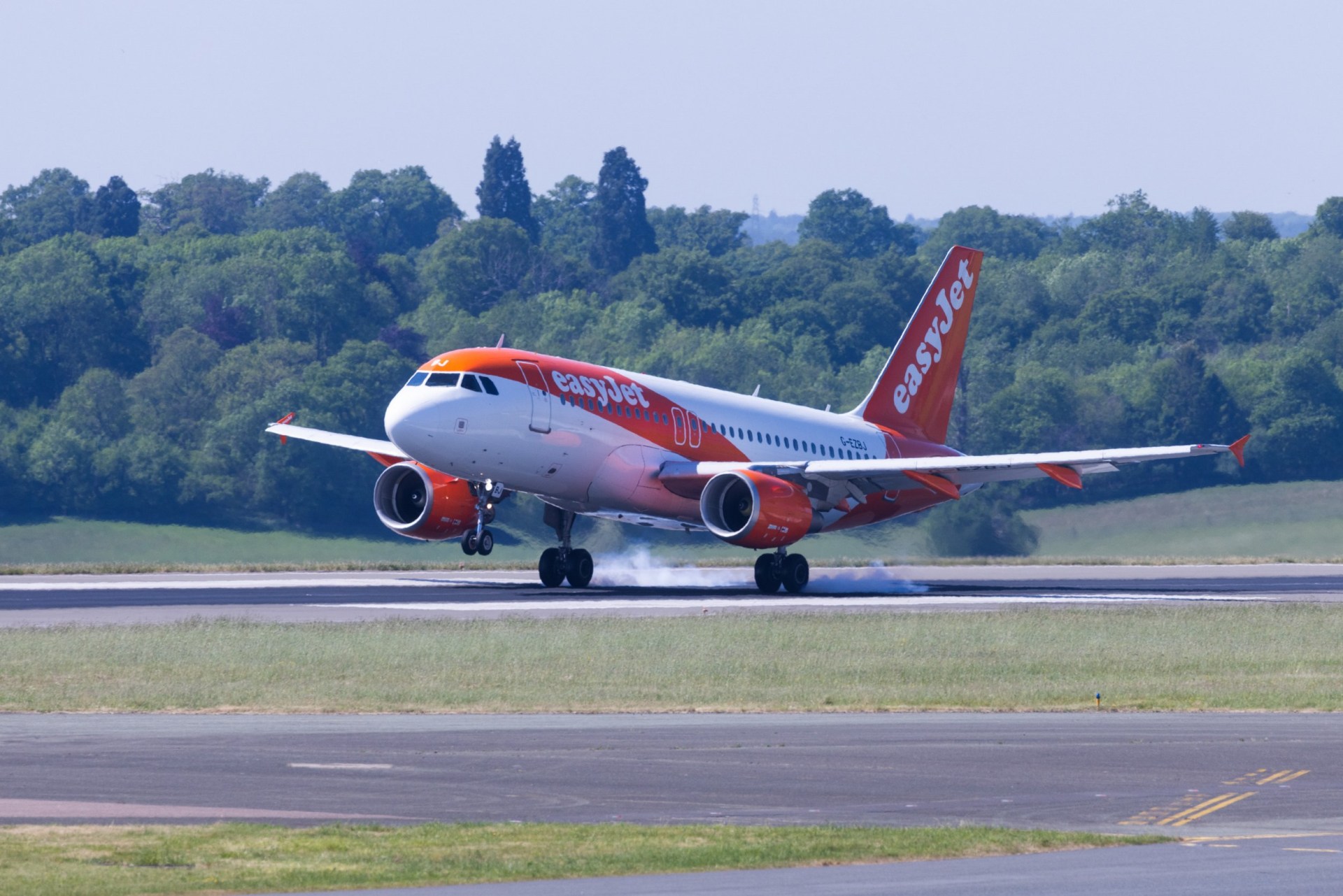 EasyJet flight diverted after woman 'grabs emergency exit and screams ...