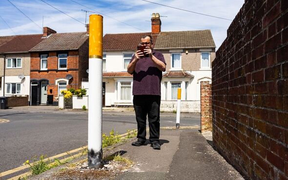 Fury in UK town over 'disgusting' bollards painted to look like cigarettes