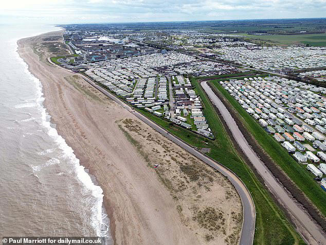 Hero, 60, dies trying to save children who 'got into difficulty' in the sea