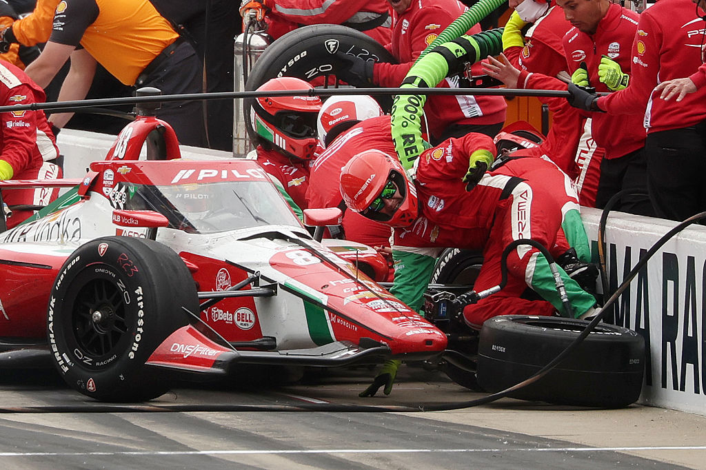 Terrifying scenes as rookie crashes into pit crew