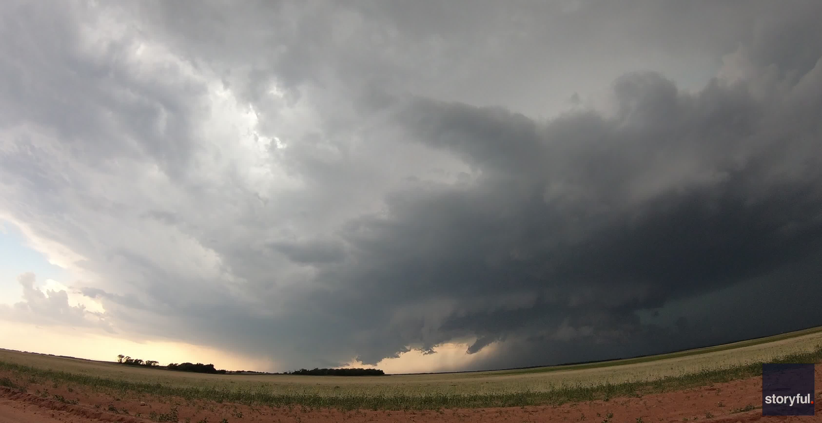 Lightning Strikes as Mesmerizing Supercell Spins Through Field