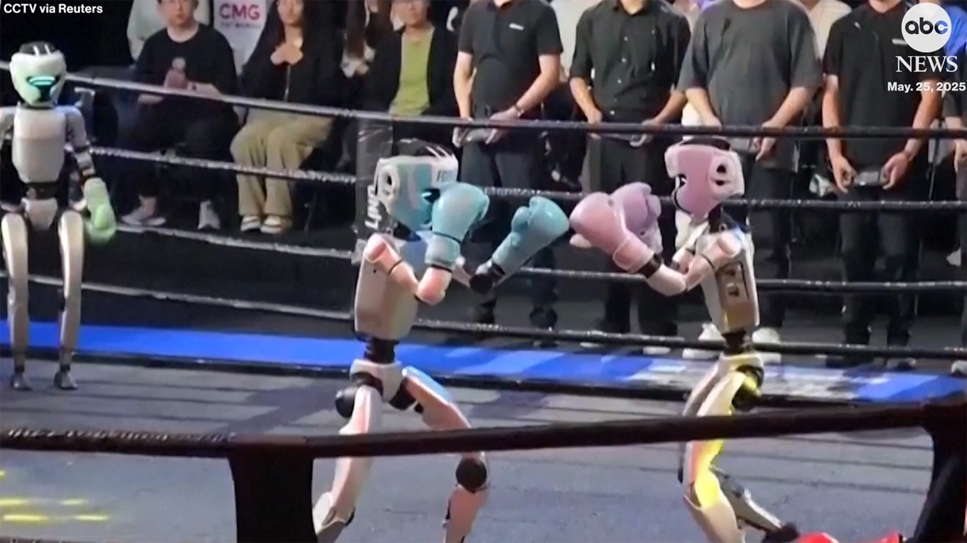 Humanoid robots pack a futuristic punch in boxing ring