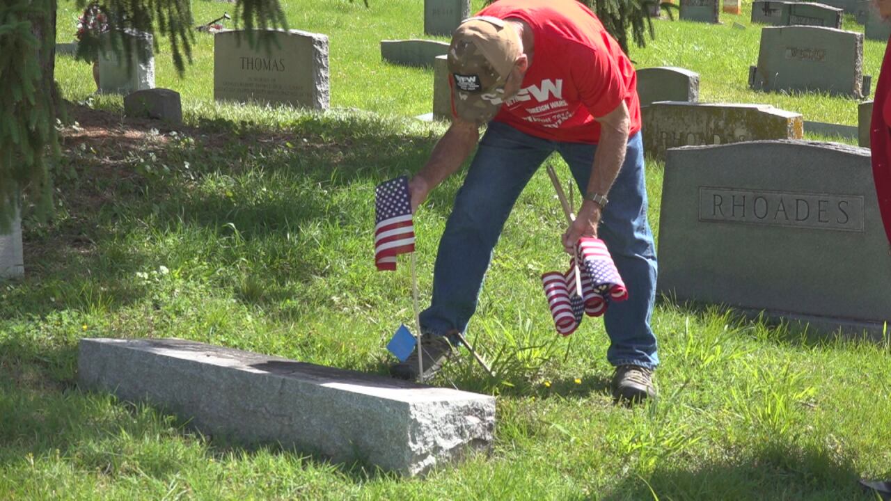 VFW, community honors late veterans with Flags-In ceremony