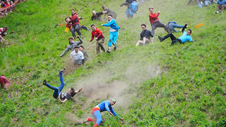 Gloucestershire cheese rolling race won again by German YouTuber Tom Kopke