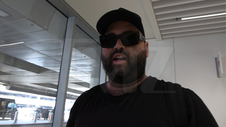 Celeb Chef Andrew Zimmern Rips Diddy for Putting Apple Sauce on Burgers