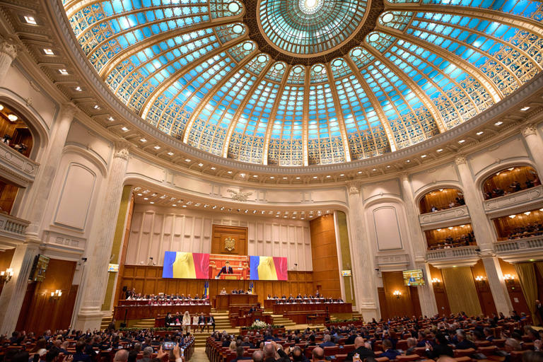 Romania's new president is sworn in as a political crisis eases, but ...