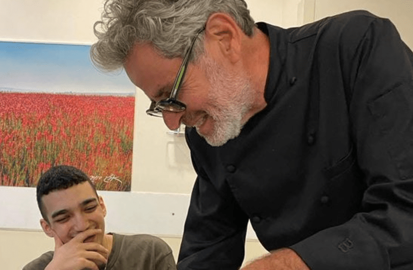 Celebrity chef Eyal Shani cooks a meal for former hostage Edan ...