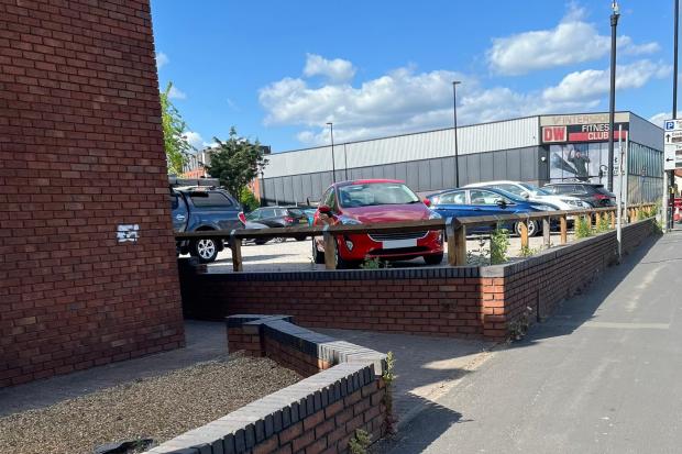 Council update on planning enforcement over car park on demolished ...