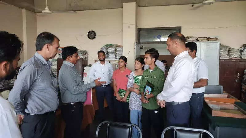 Class X, XII toppers get a taste of civil services, spend day with top ...