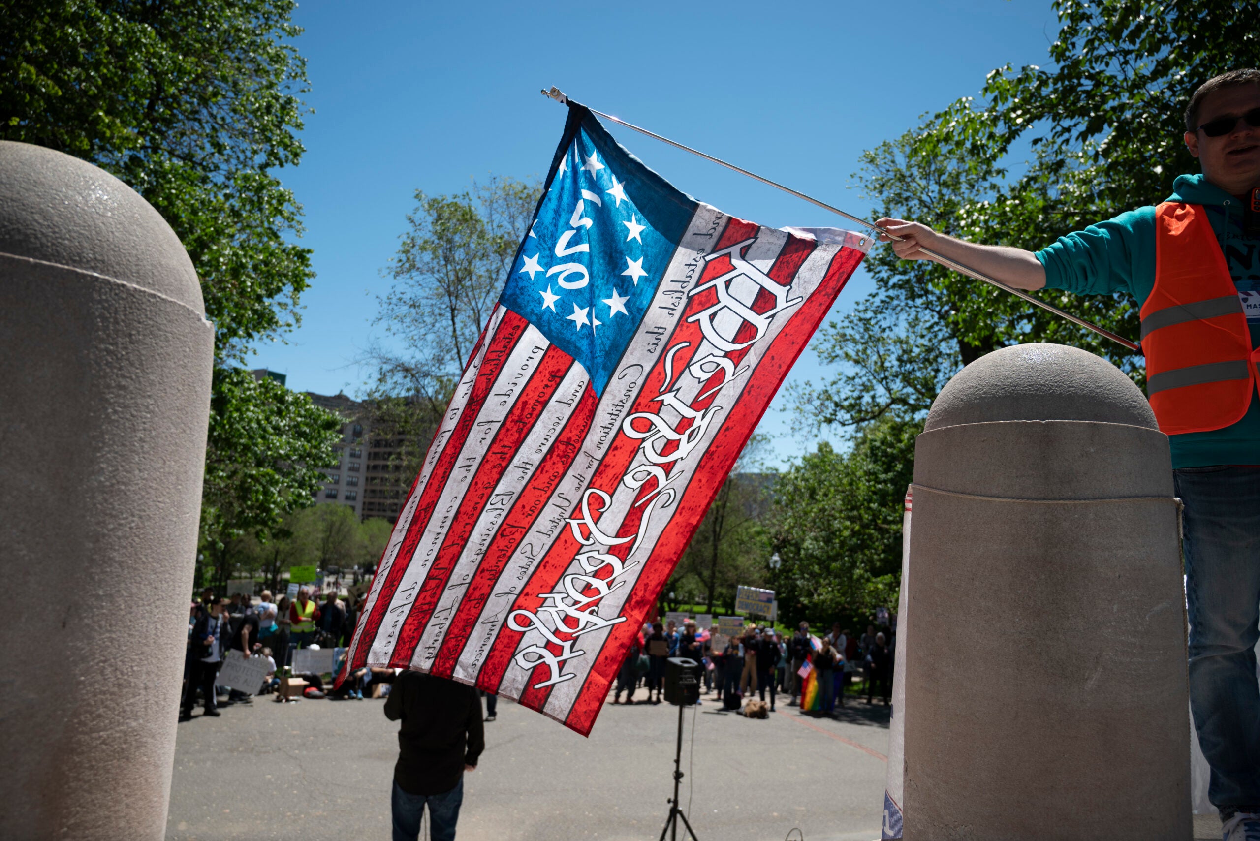 Protesters honor veterans, rally for immigrant rights on Memorial Day ...