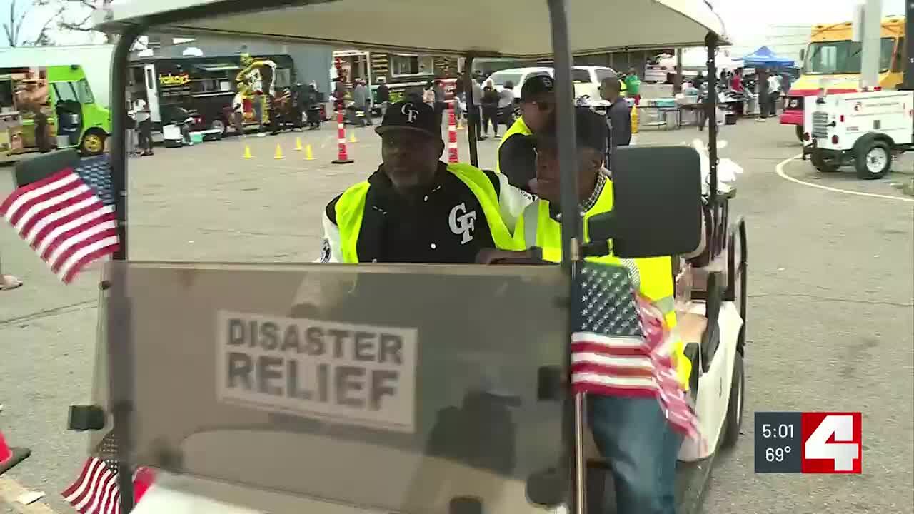 Volunteers offer hot food and other resources to storm victims