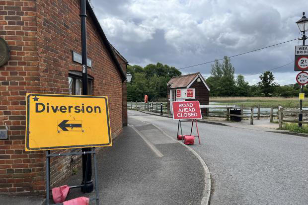 Utility works close busy road and impact toll bridge