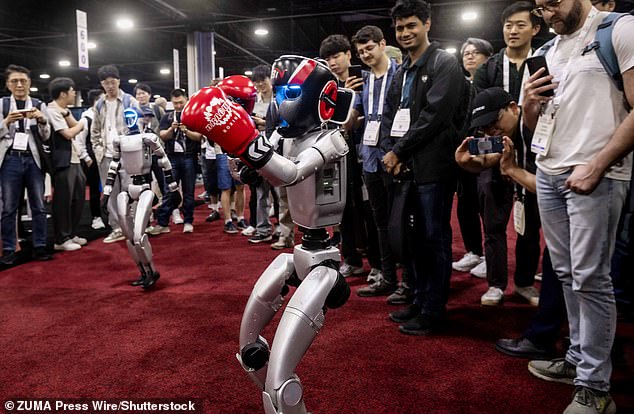 Watch as two lifesize robots swing punches at each other in the world's ...