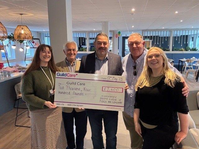 Freemasons visit Guildcare to see the impact of their support