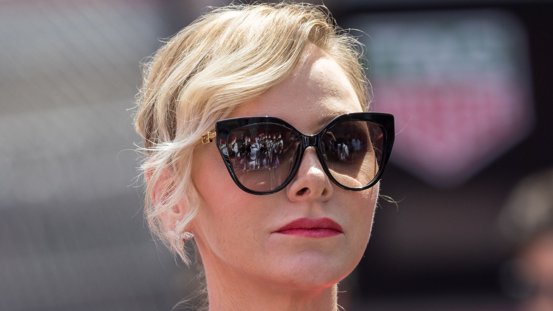 Princess Charlene causes a stir in head-to-toe scarlet and silk