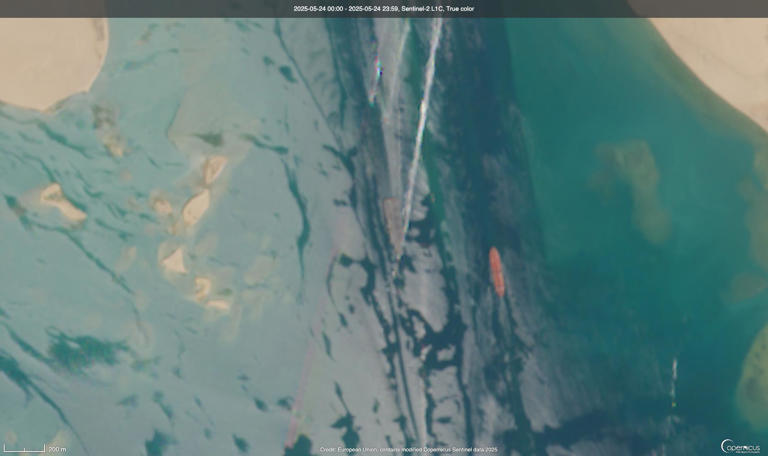 Satellite photos show British aircraft carrier heading toward Pacific