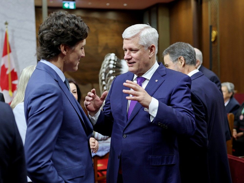 Justin Trudeau attends King Charles' throne speech wearing colourful shoes