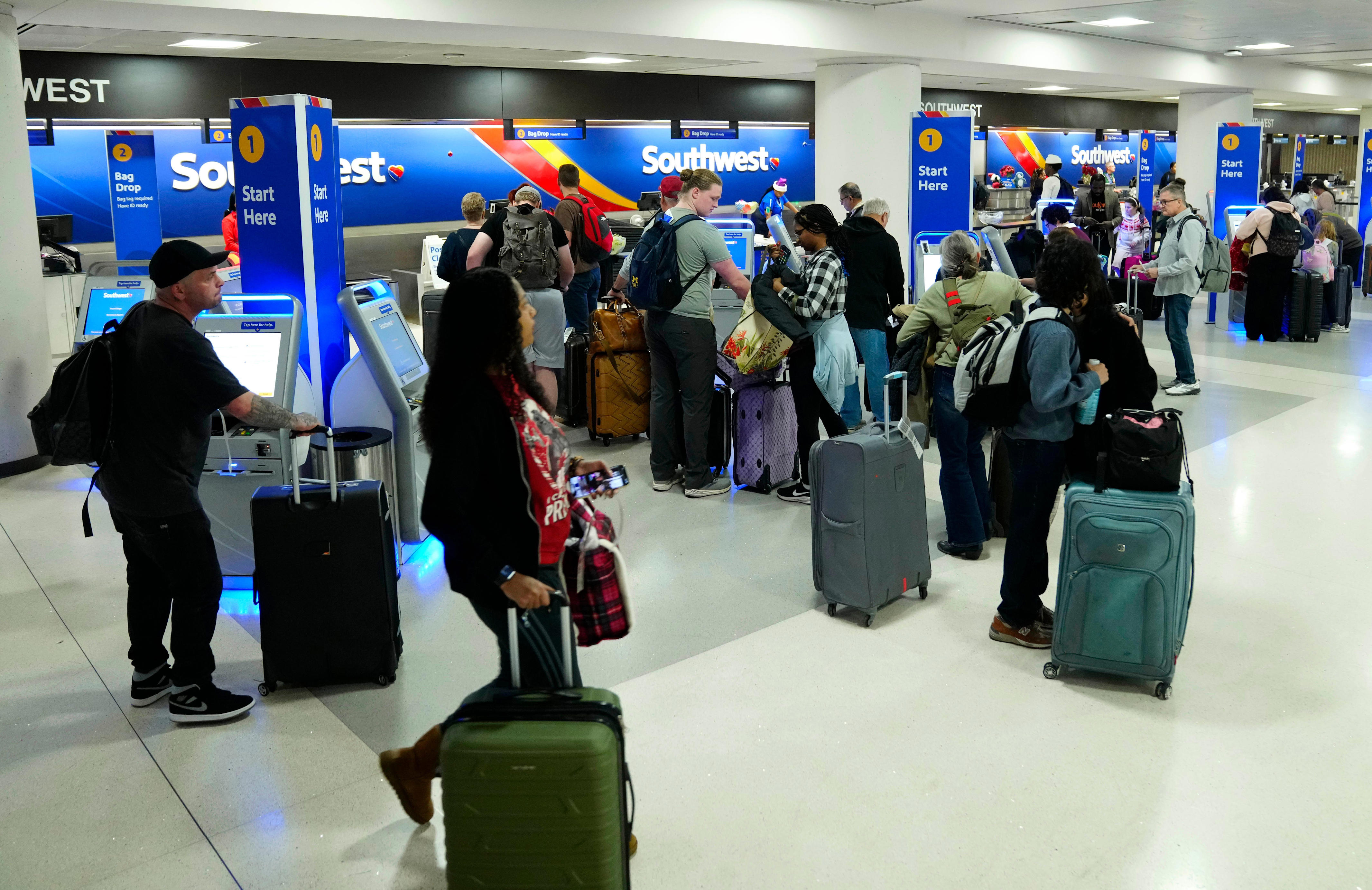 Southwest Airlines will start charging checked bag fees this week. Here ...