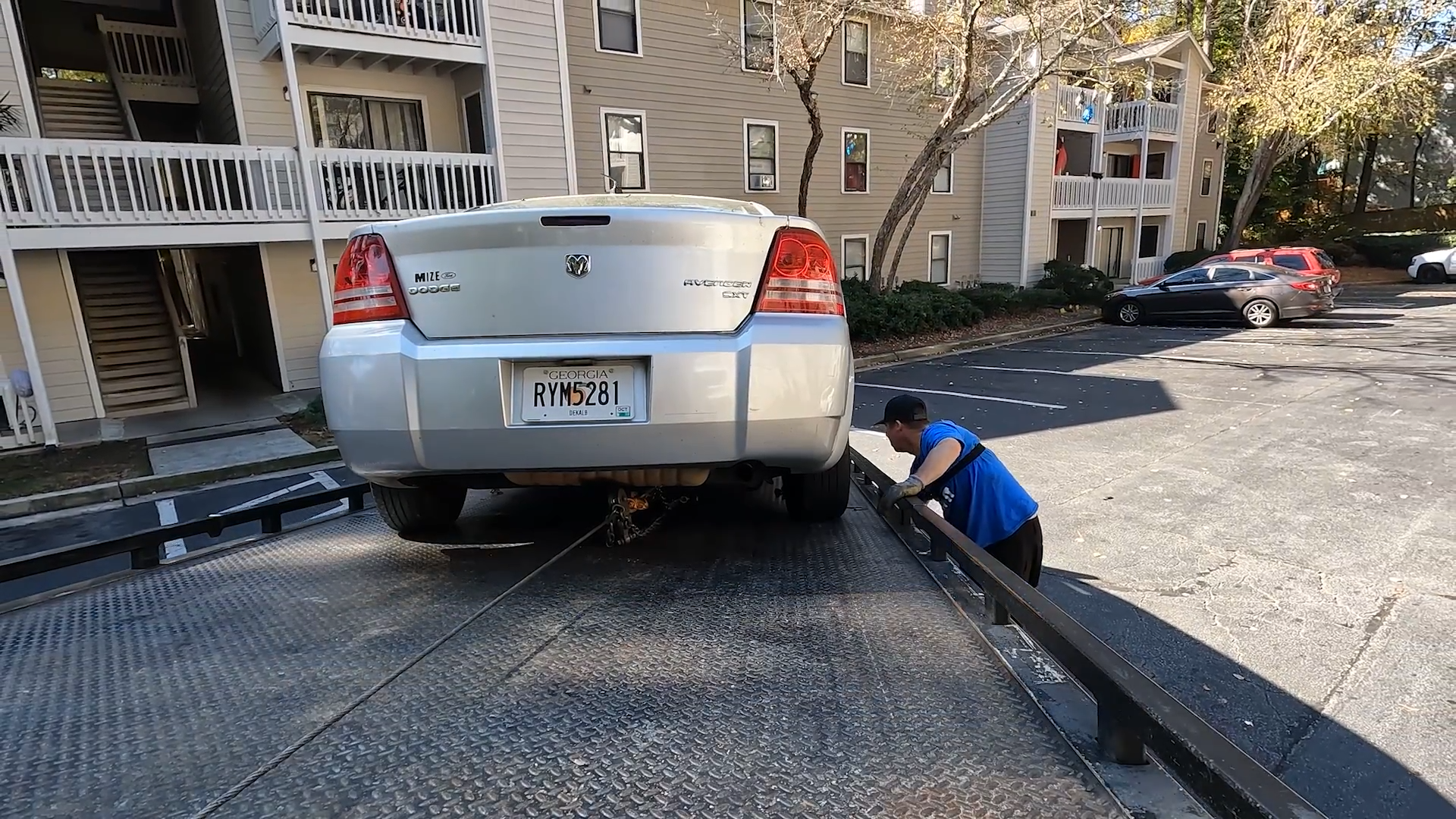 Two Tows Down…One Bullet-Damaged Cadillac to Go!