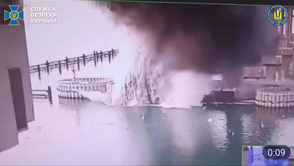 Ukraine blows up part of Crimea bridge as video of attack shows huge blast