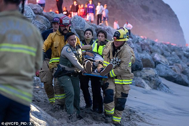 Dramatic photos show death-defying escape of victim trapped in rock ...