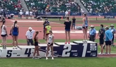 High school girls refuse to share podium with male, turn backs in protest