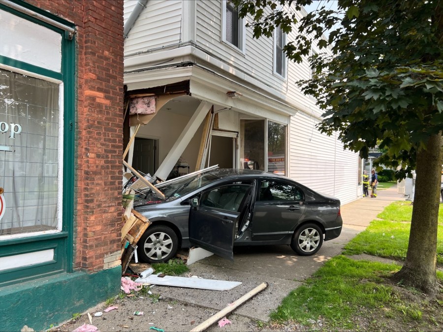 Building damaged after car crash in Elmira on Tuesday