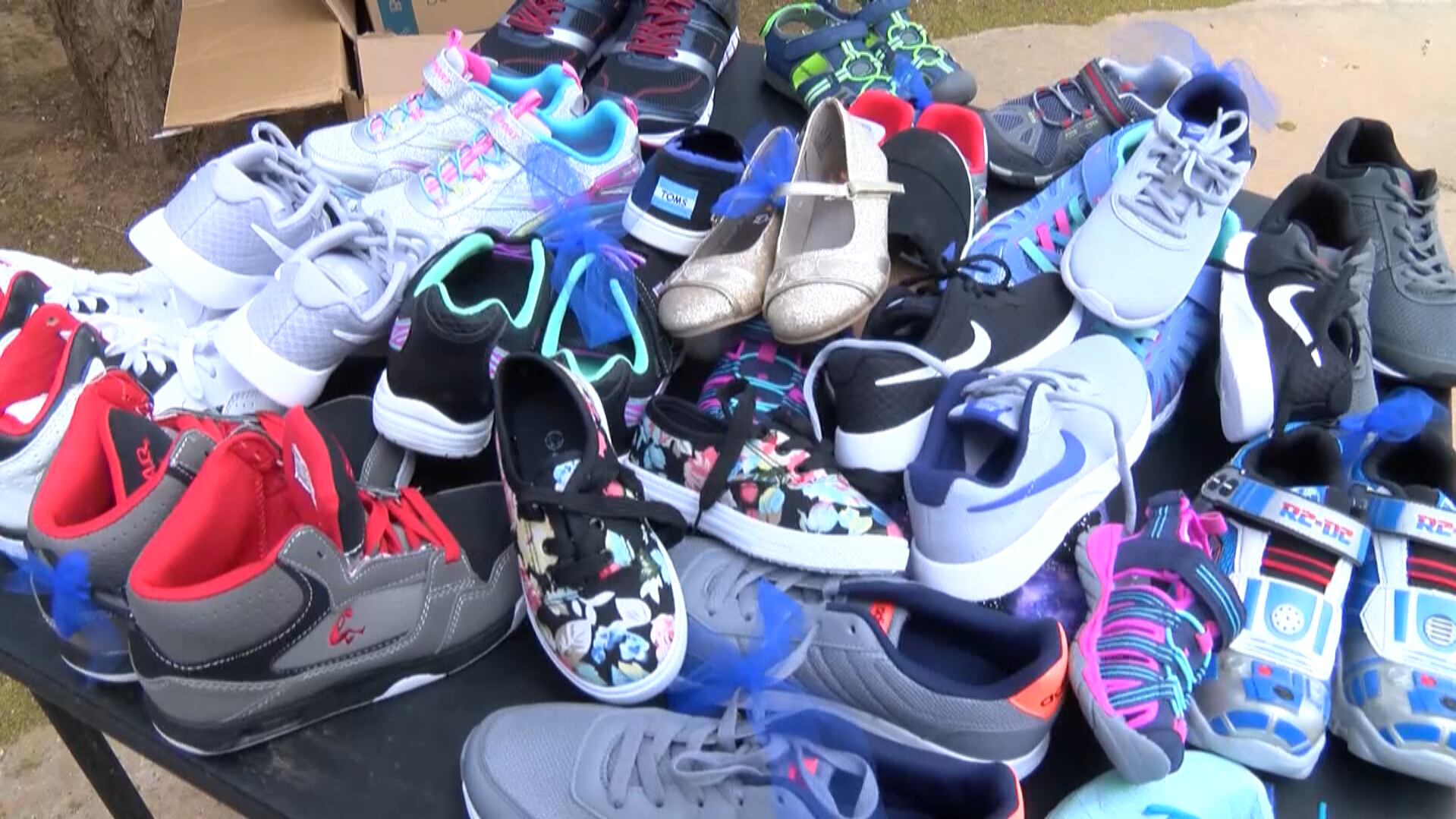 Buckner launches community shoe drive with help from Family Life Radio