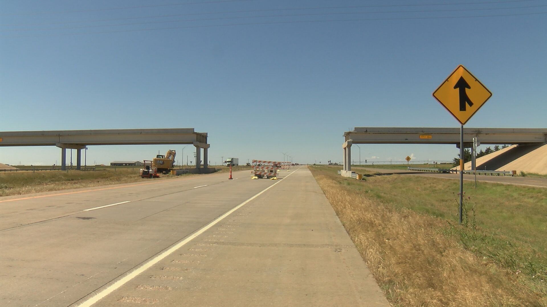 Section of damaged bridge cleared between Kress and Tulia