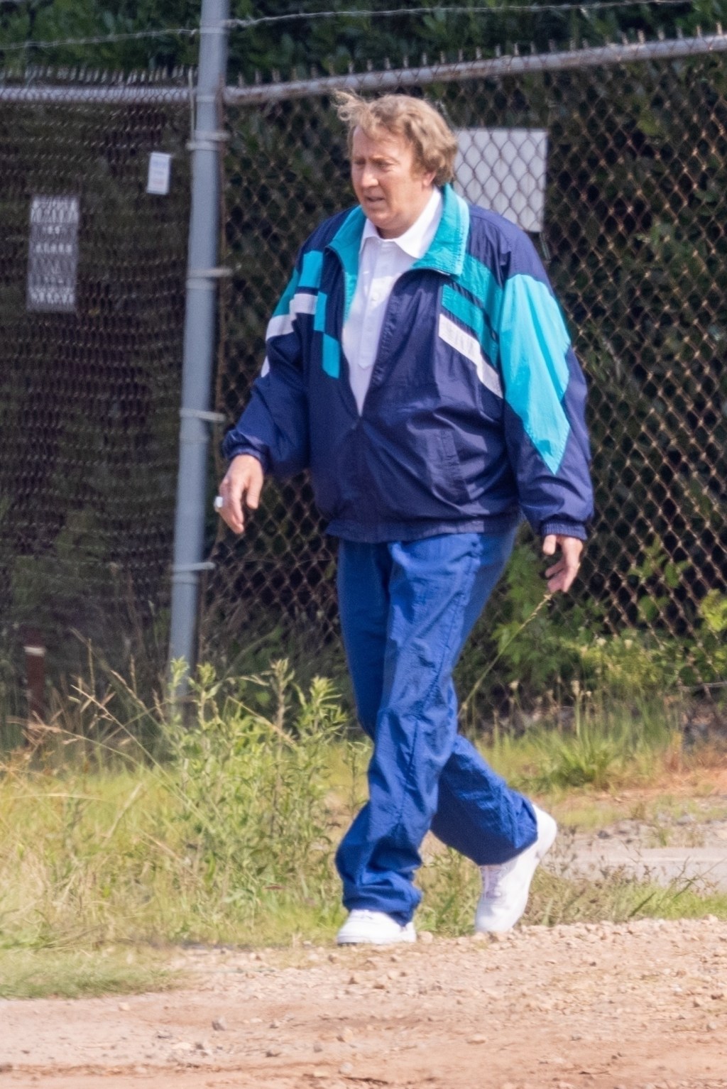 Nicolas Cage looks unrecognizable in fat suit while filming upcoming ...