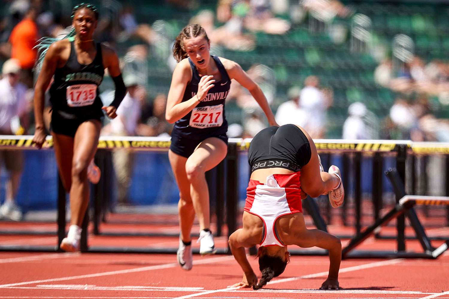 High School Runner Wins Gold After Somersaulting Over Finish Line in ...