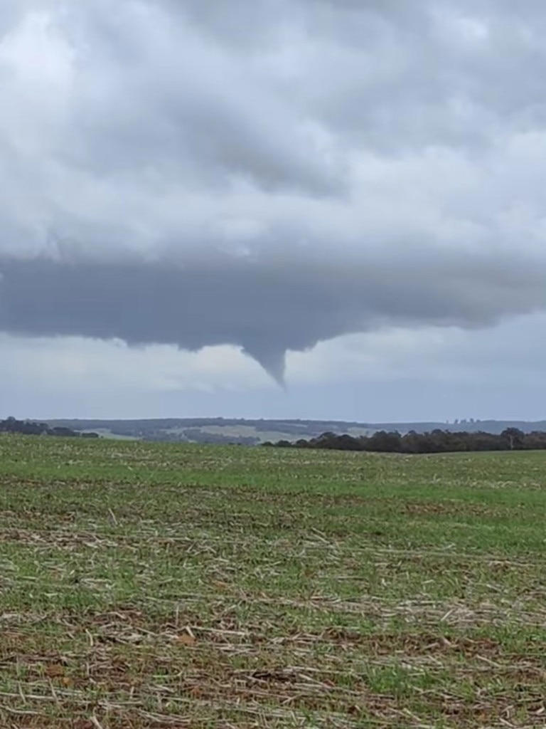 ‘Wow’: Tornado flips ute, golf ball-sized hail