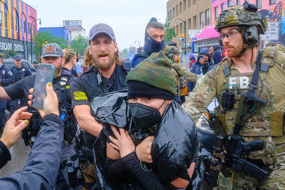 Federal officers in tactical gear went into a Latino community in ...