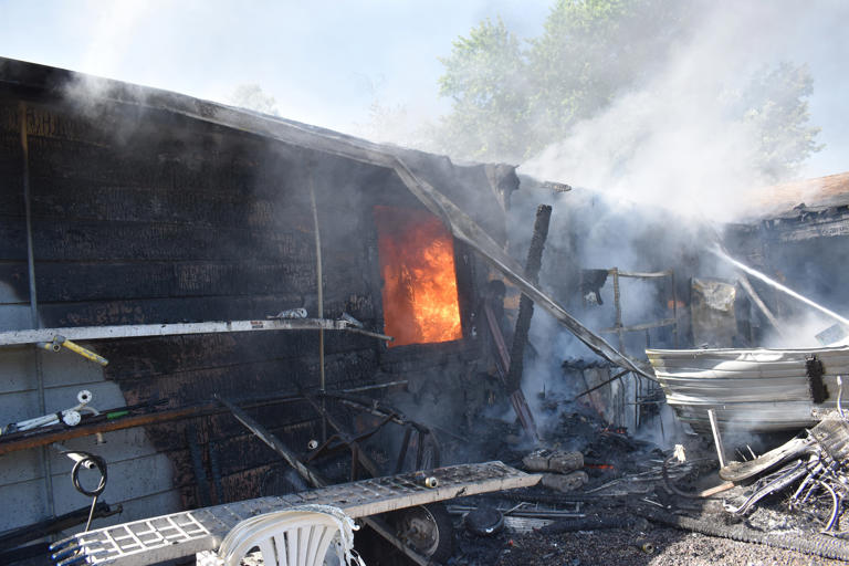 Firefighters find leaking gas cylinder while battling house fire in ...