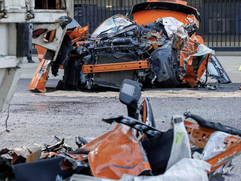 Horror pics of fatal crash with parked truck