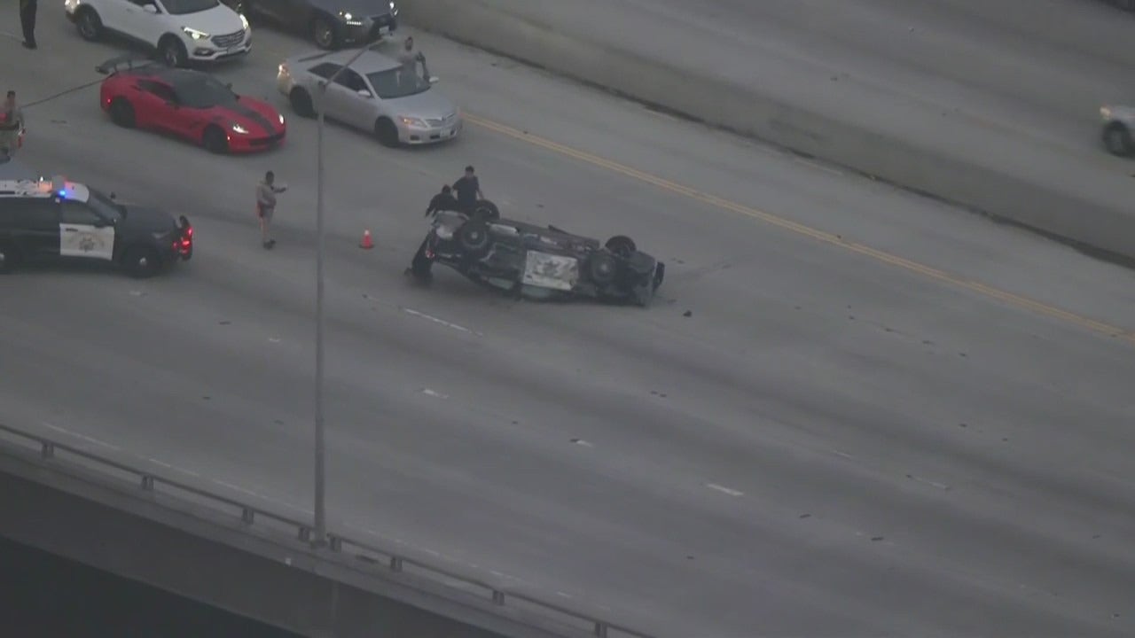 Cop car flips over following pursuit in Long Beach