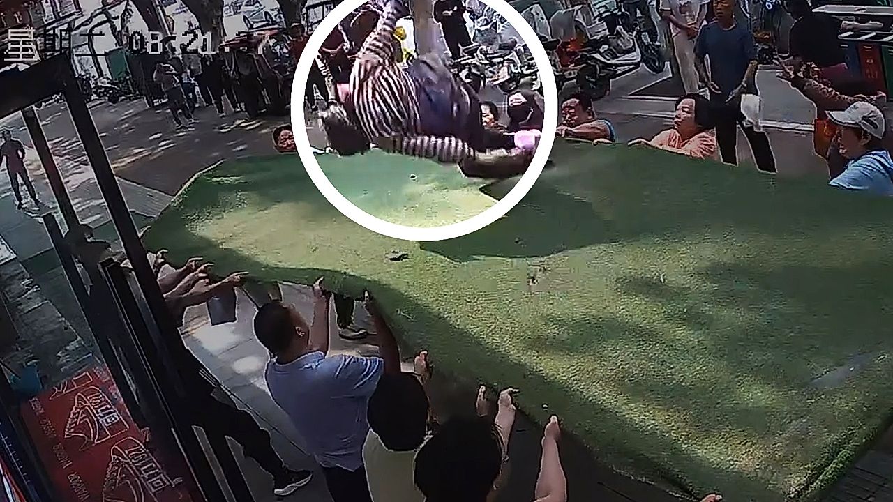 Quick-thinking residents catch 102-year-old woman falling from building