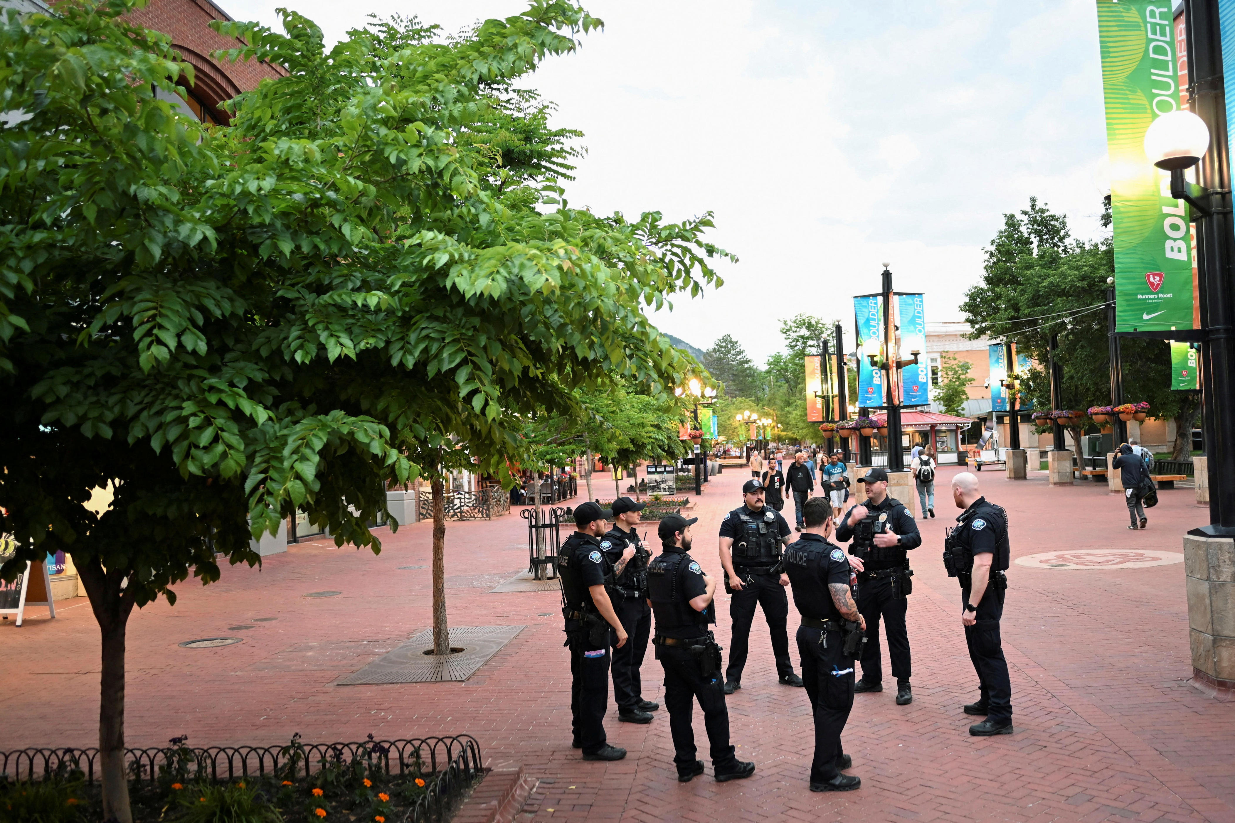 Judge temporarily blocks deportation of family of man charged in ...