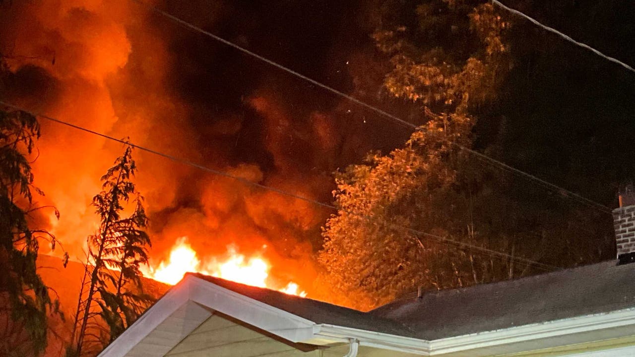 Woman in critical condition after Seattle house fire