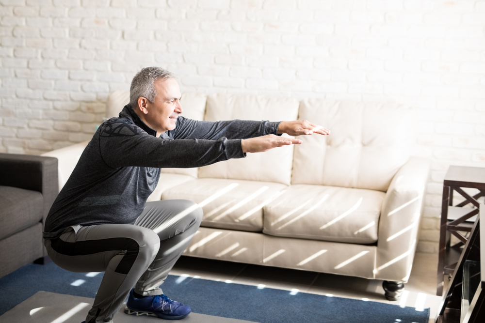 How many squats adults should manage at different ages