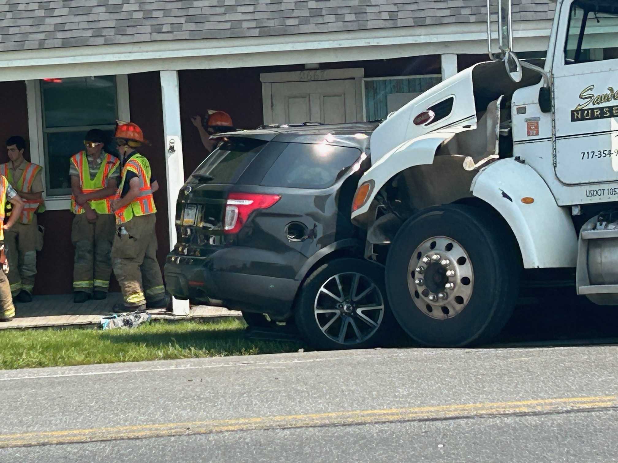 Multiple people hospitalized after dump truck T-bones SUV on Route 23