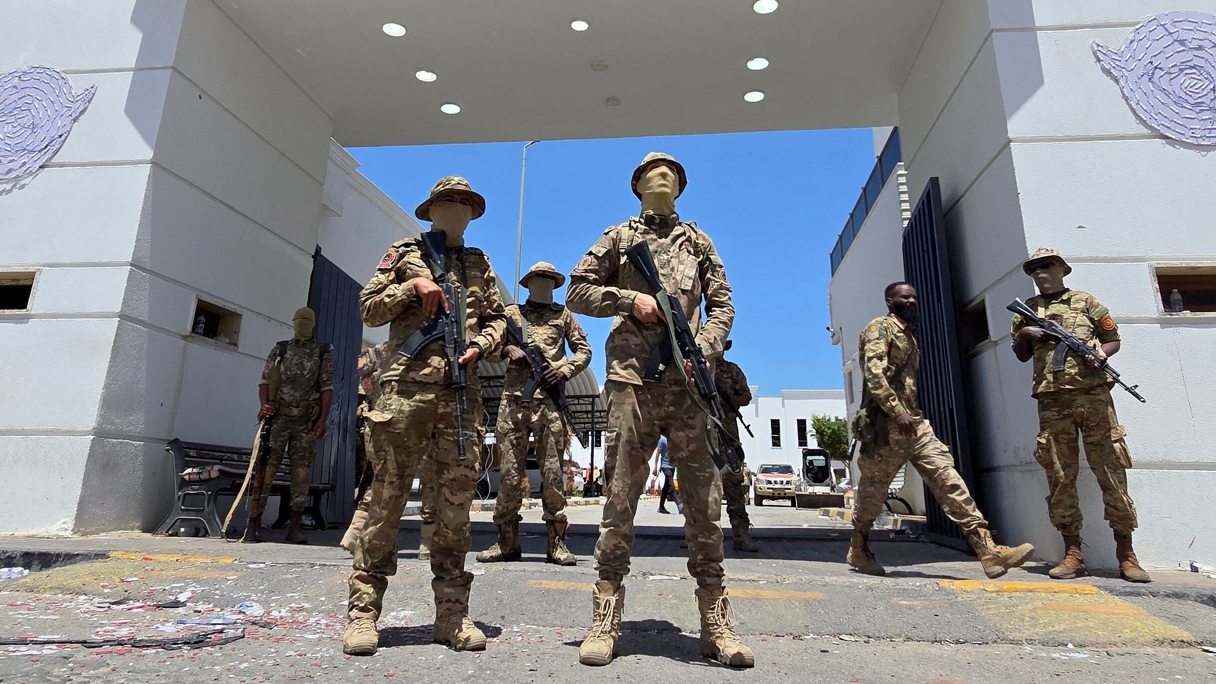 Dozens of charred bodies found buried in militia-controlled area of ...