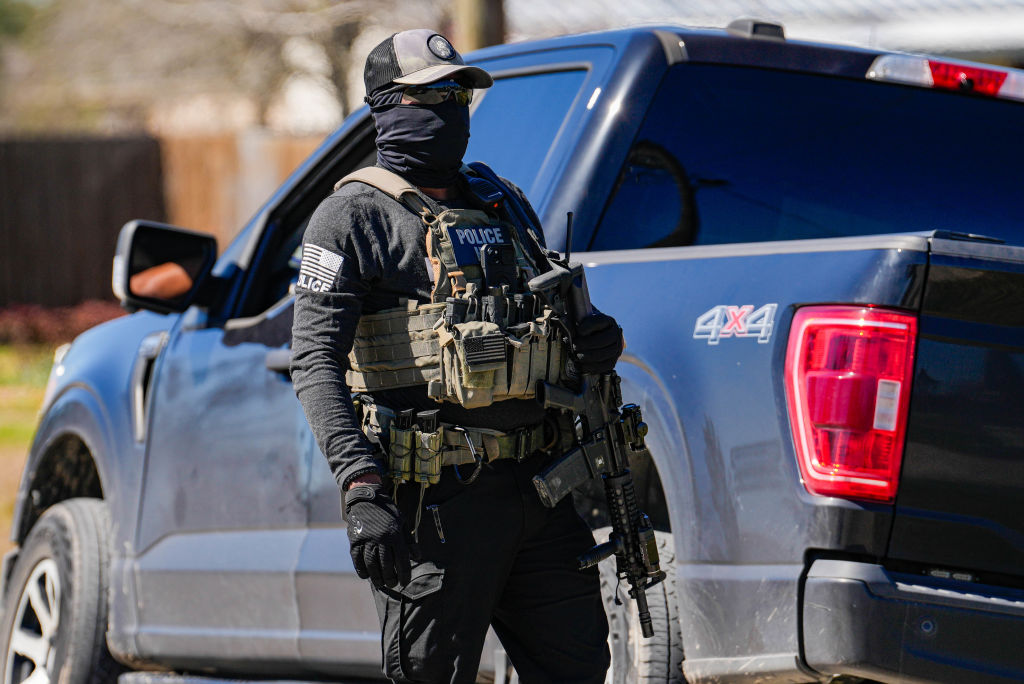 Outrage grows after ICE agents with assault rifles use flash grenades ...